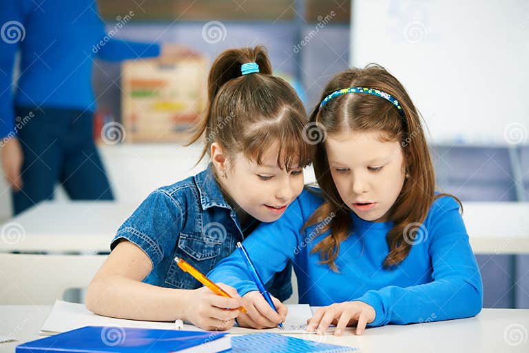 Children Learning at Elementary School Stock Photo - Image of hair ...