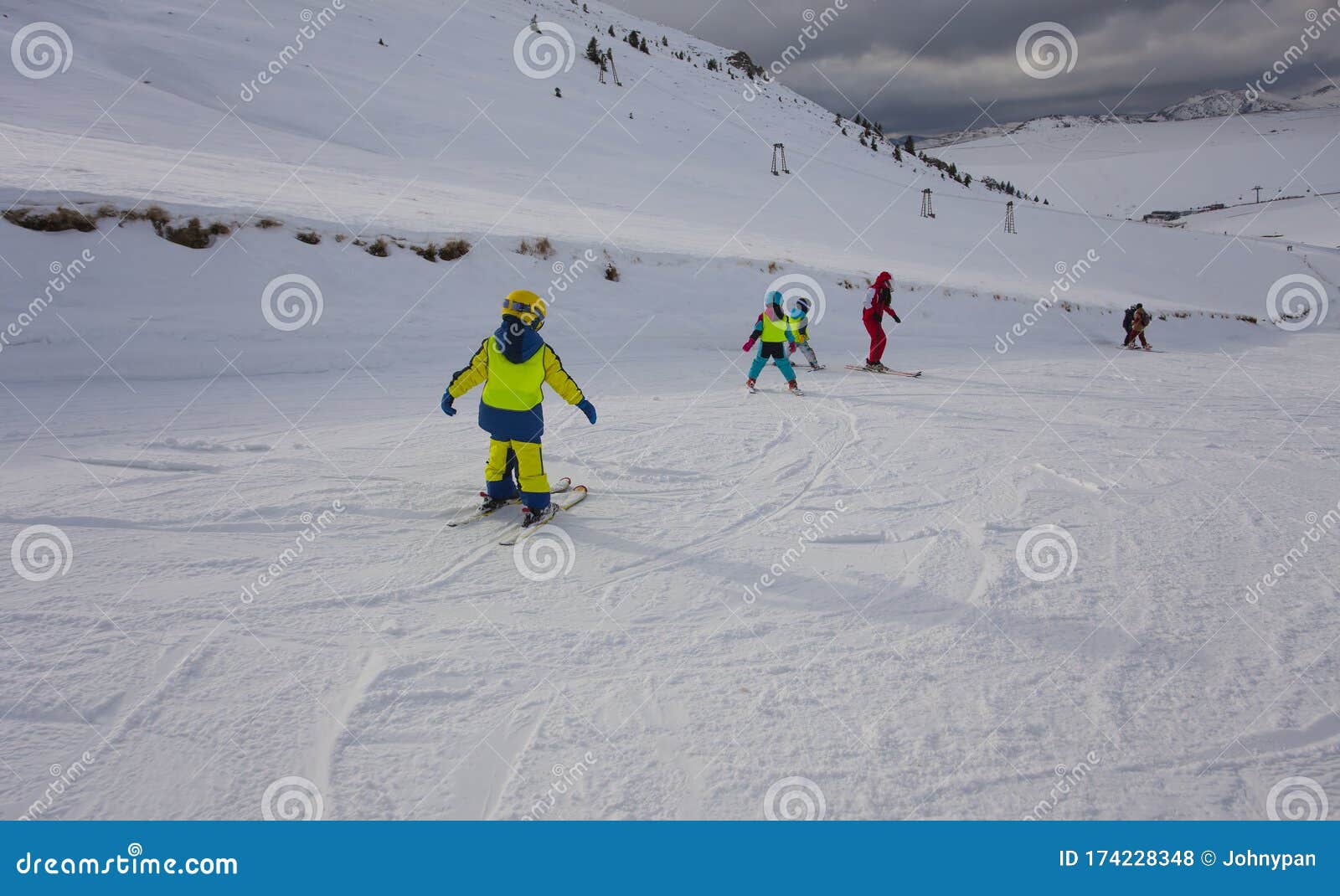 Children Learning How To Ski on Mountain Slope Stock Photo - Image of ...