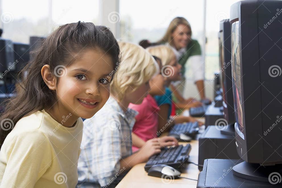 Children Learning How To Use Computers. Stock Image - Image of color ...
