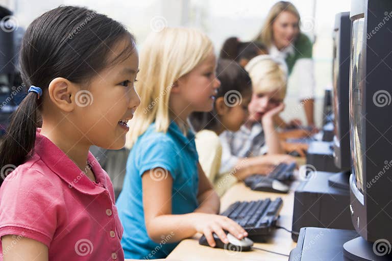 Children Learning How To Use Computers. Stock Photo - Image of ...