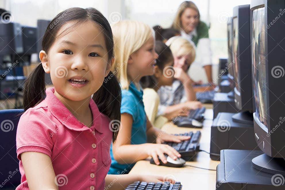 Children Learning How To Use Computers. Stock Photo - Image of computer ...