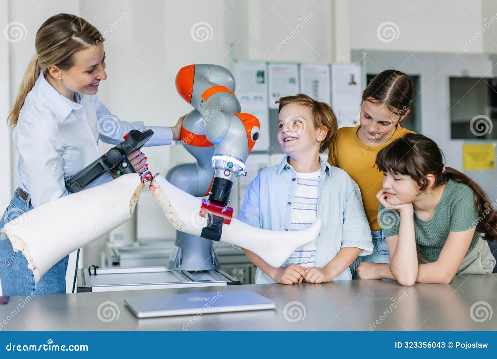 Children Learning Robotics in Elementary School. Young Students Going ...