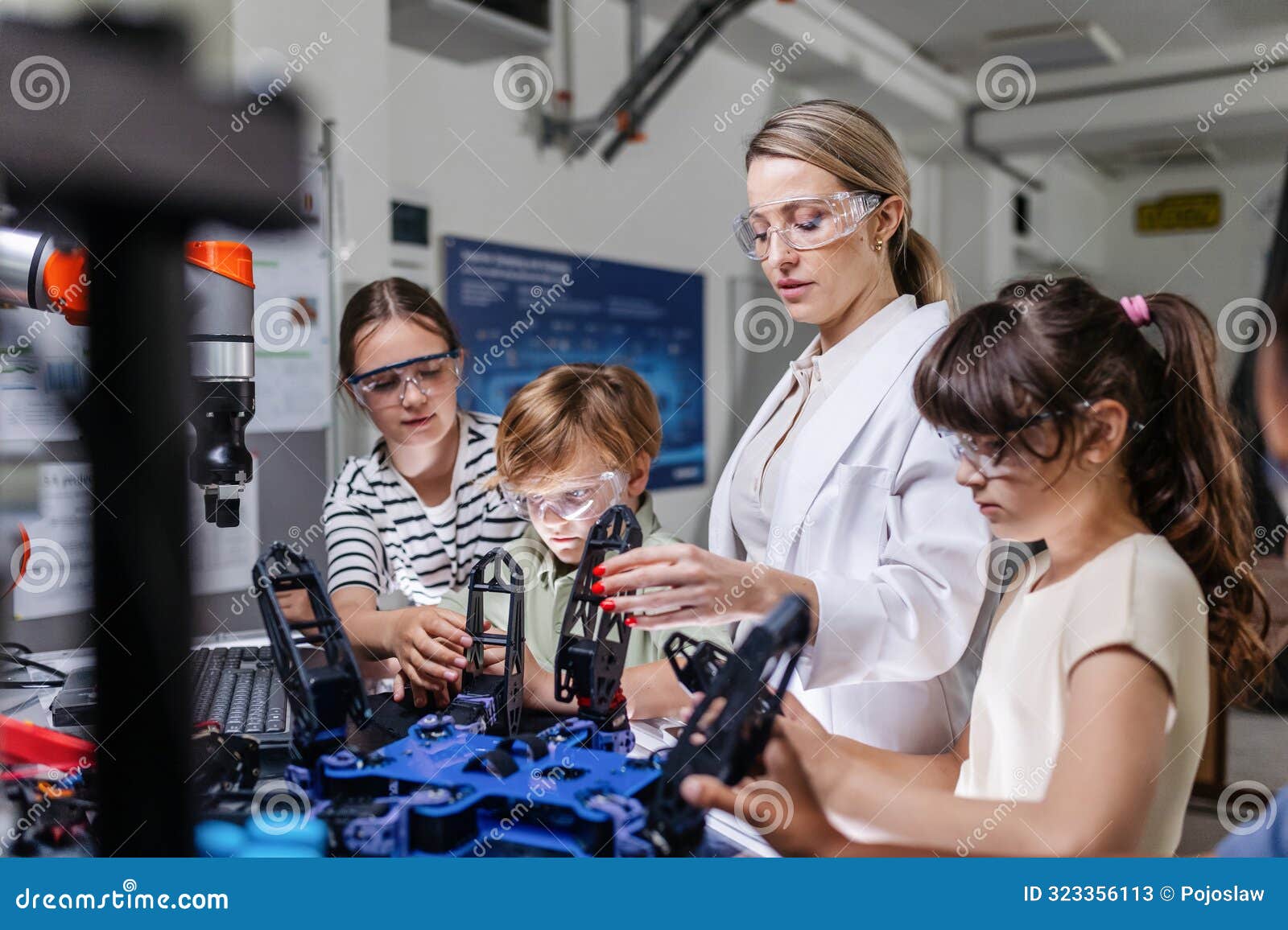 Children Learning Robotics in Elementary School. Young Students ...