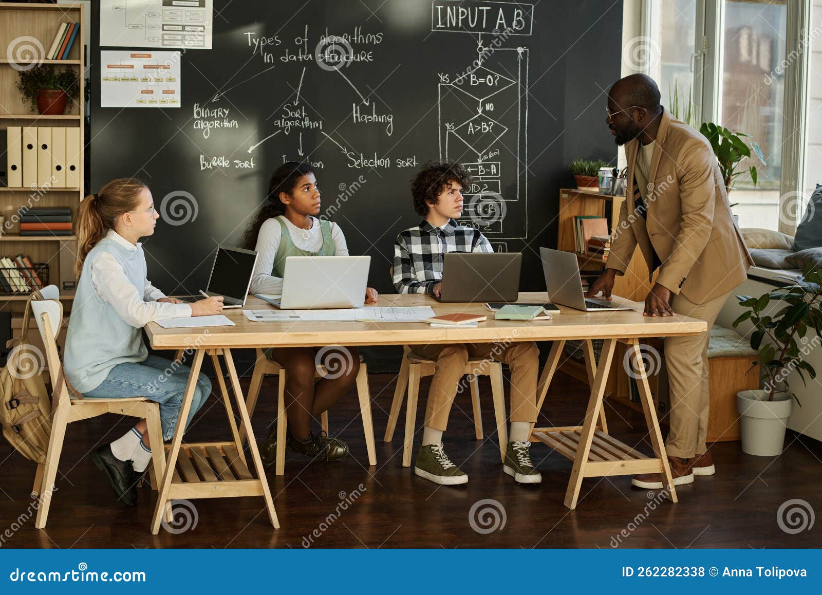 Children Learning To Use Computers at Lesson Stock Photo - Image of ...