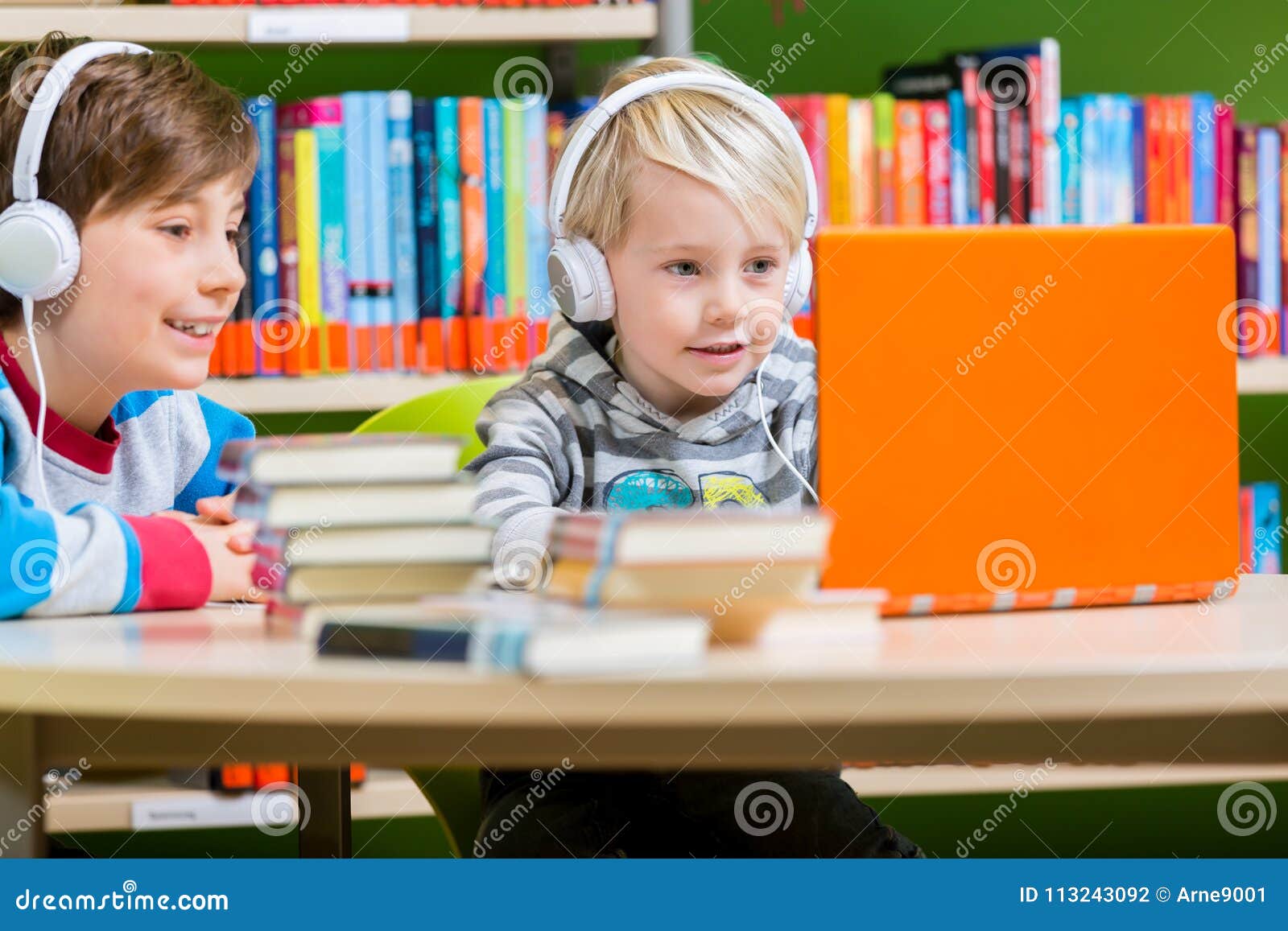Children in a Library Listening To Audio Books Stock Photo - Image of ... Children in a Library Listening To Audio Books Stock Photo - Image of ...