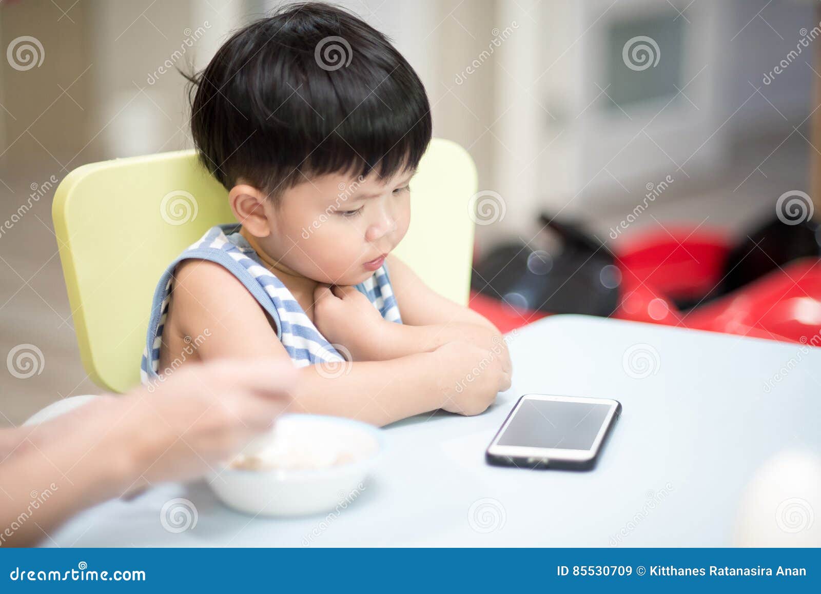 Children are Looking Mobile Phone at Home. Stock Image - Image of young ...