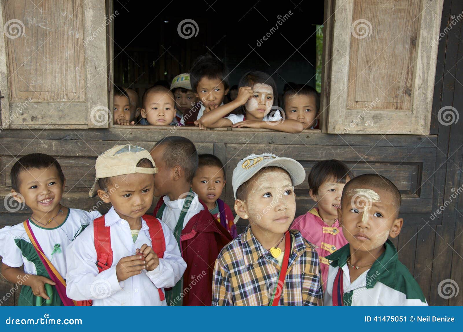 Children Looking For Something In A Water Pond In The Zaurolandia ...