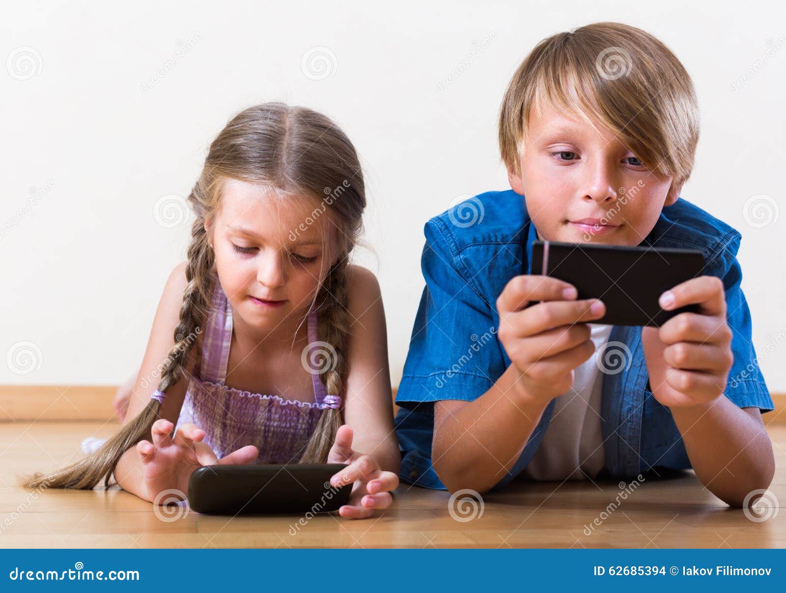 Children Looking at Screen of Smartphones Stock Photo - Image of gadget ...