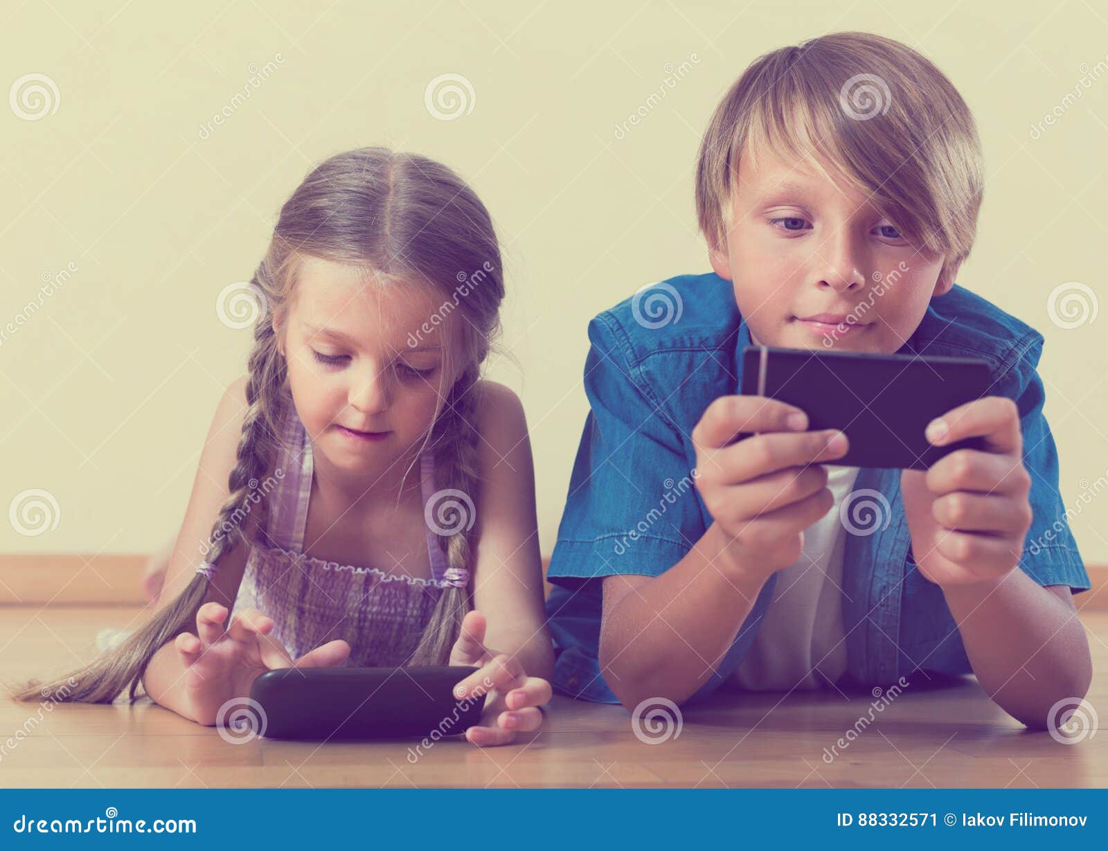 Children Looking at Screen of Smartphones Stock Image - Image of online ...