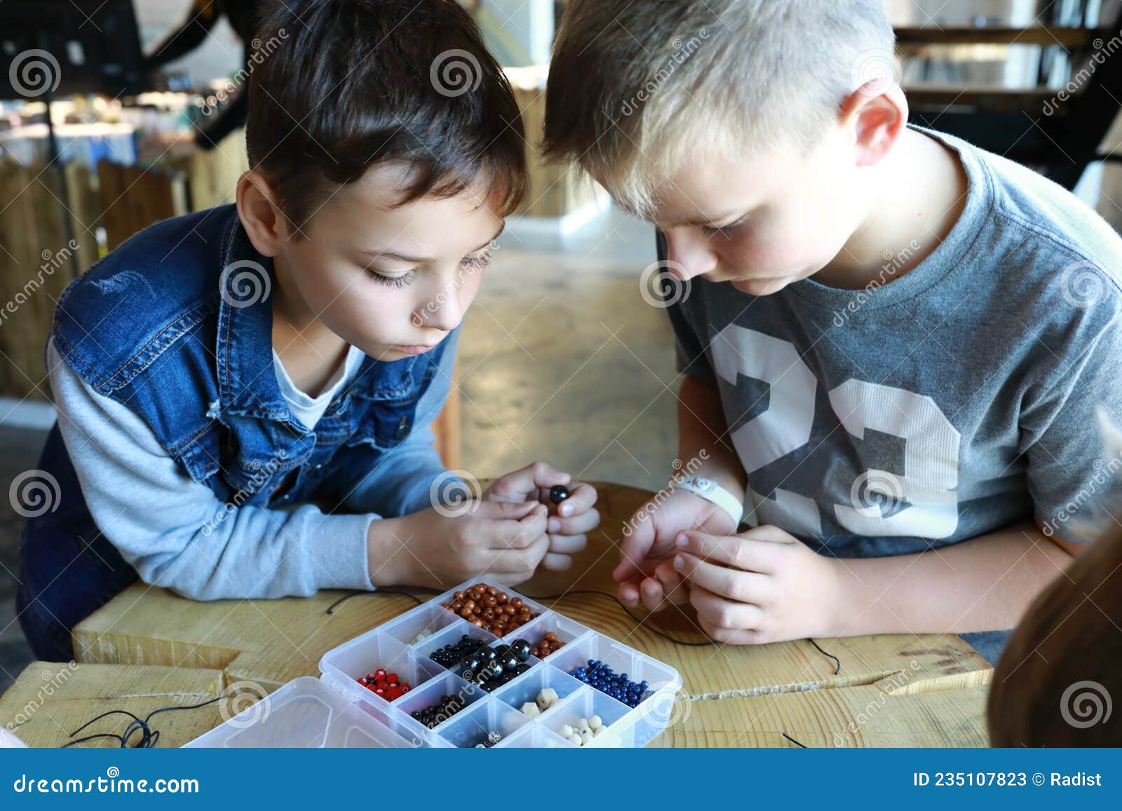 Children Making Bracelets at Workshop Stock Image - Image of children ...