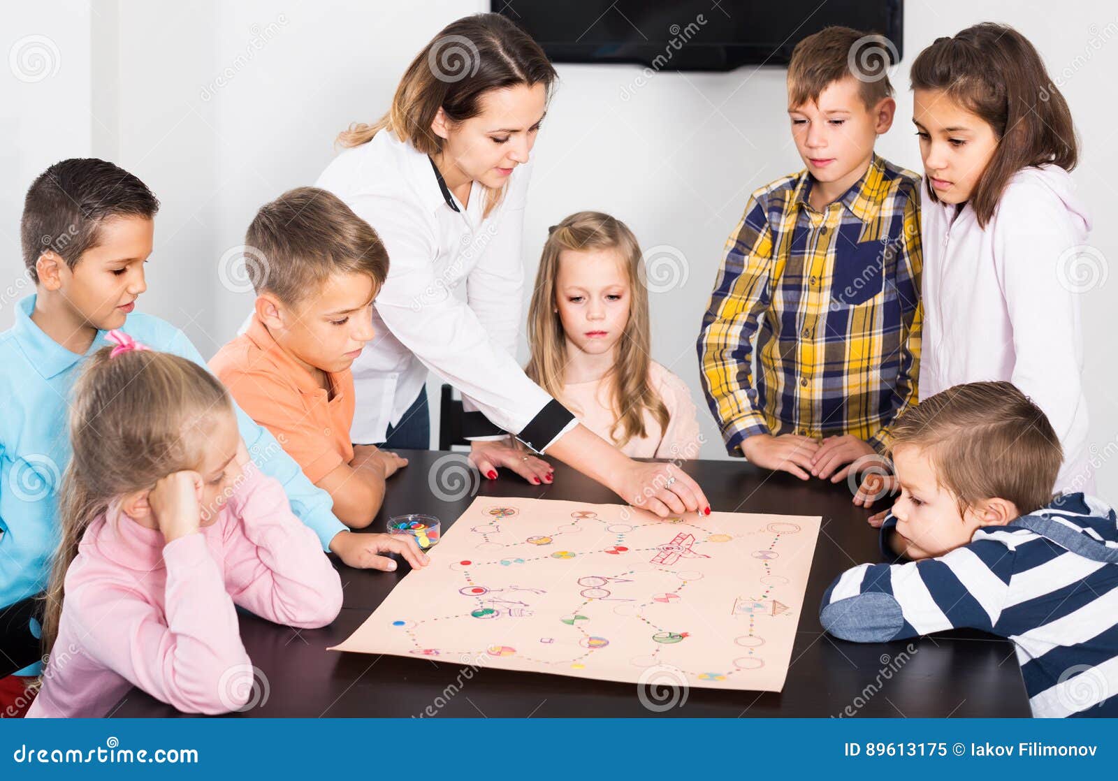 Children Making Move on Pre-marked Surface of Board Game Stock Image ...