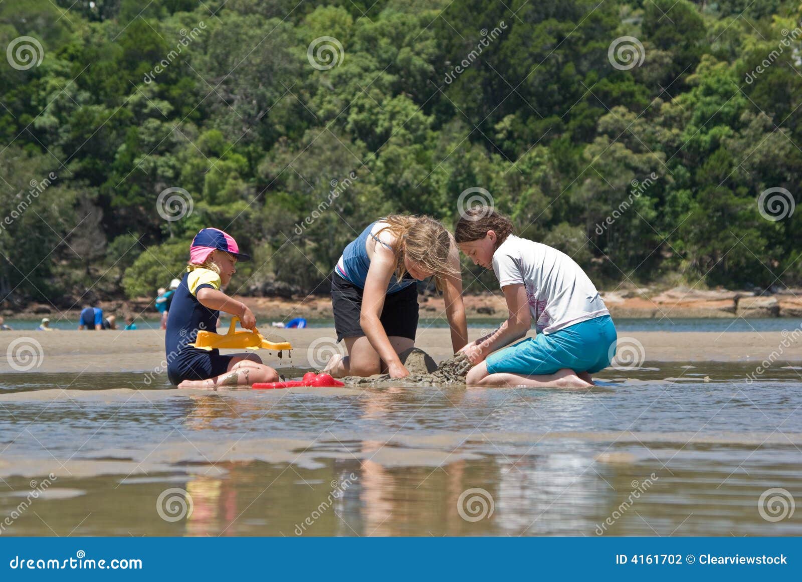 Children Making Sand Castles Stock Photo - Image of girl, teenagers ...