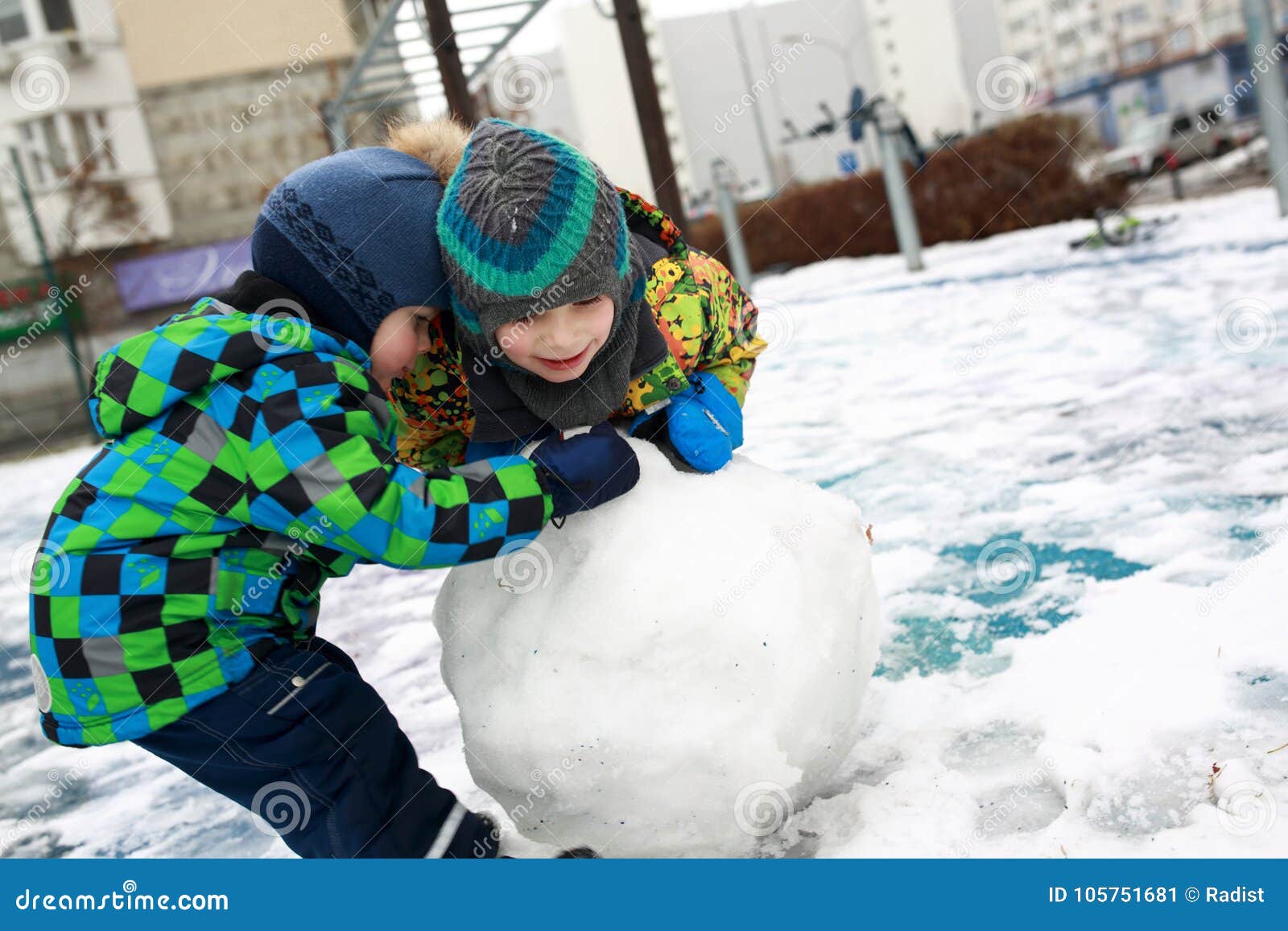 Children making snowman stock image. Image of playing - 105751681