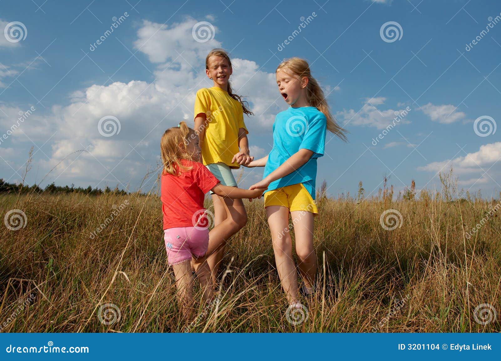 Children on a meadow stock photo. Image of colourful, exaltation - 3201104