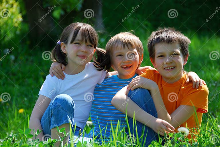 Children in meadow stock photo. Image of brothers, happy - 5228886