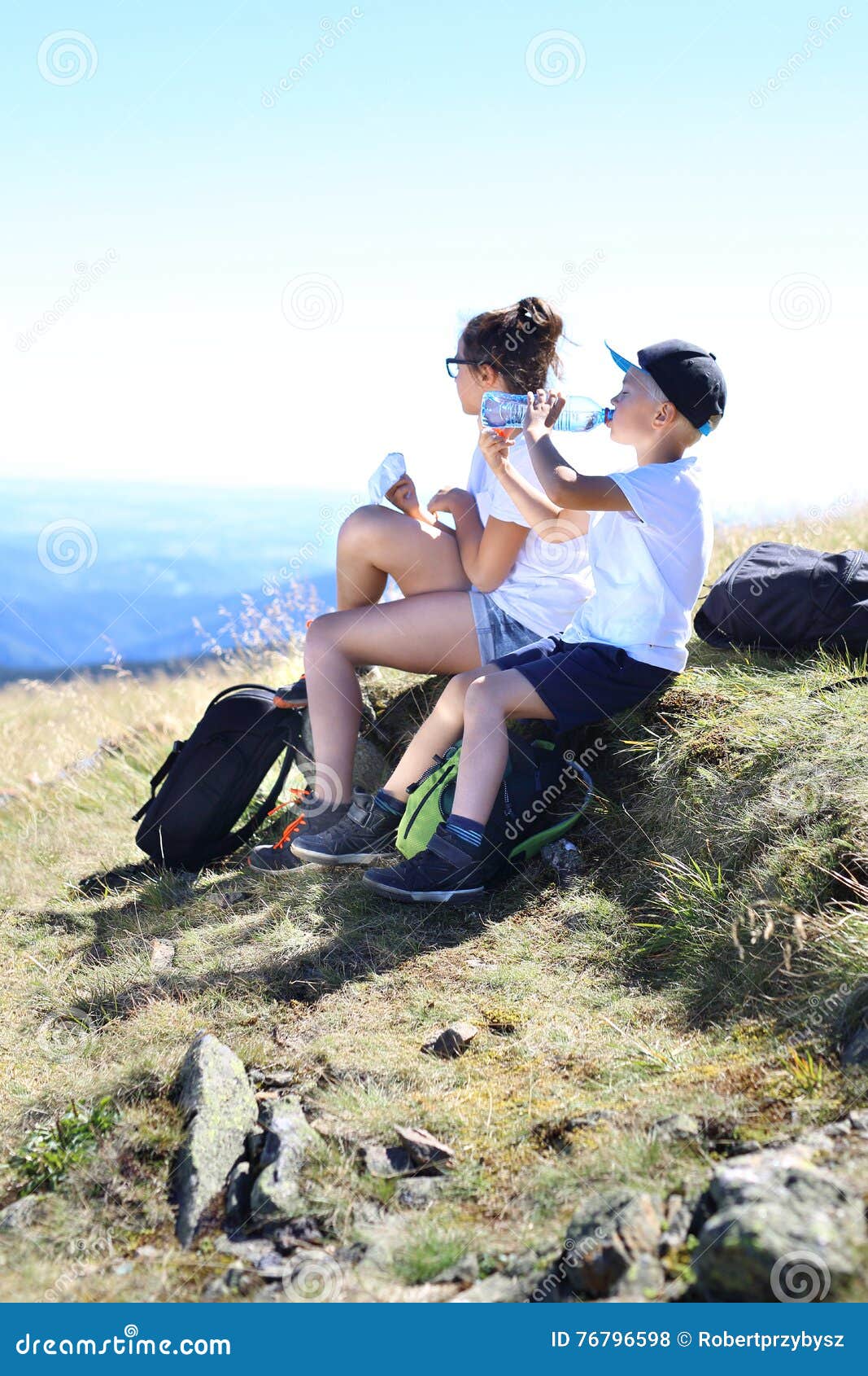 Children in the mountains. stock photo. Image of leisure - 76796598
