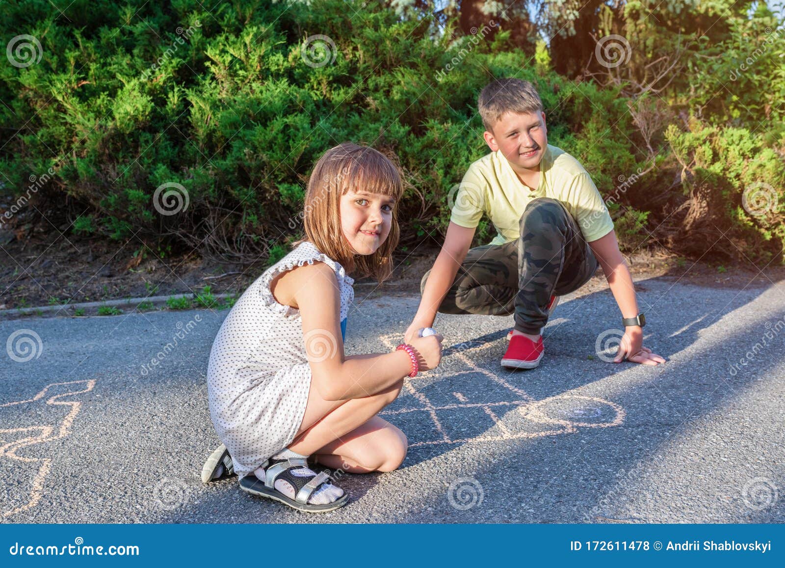 Children Outdoors Paint on the Pavement and Pose for the Camera Stock ...
