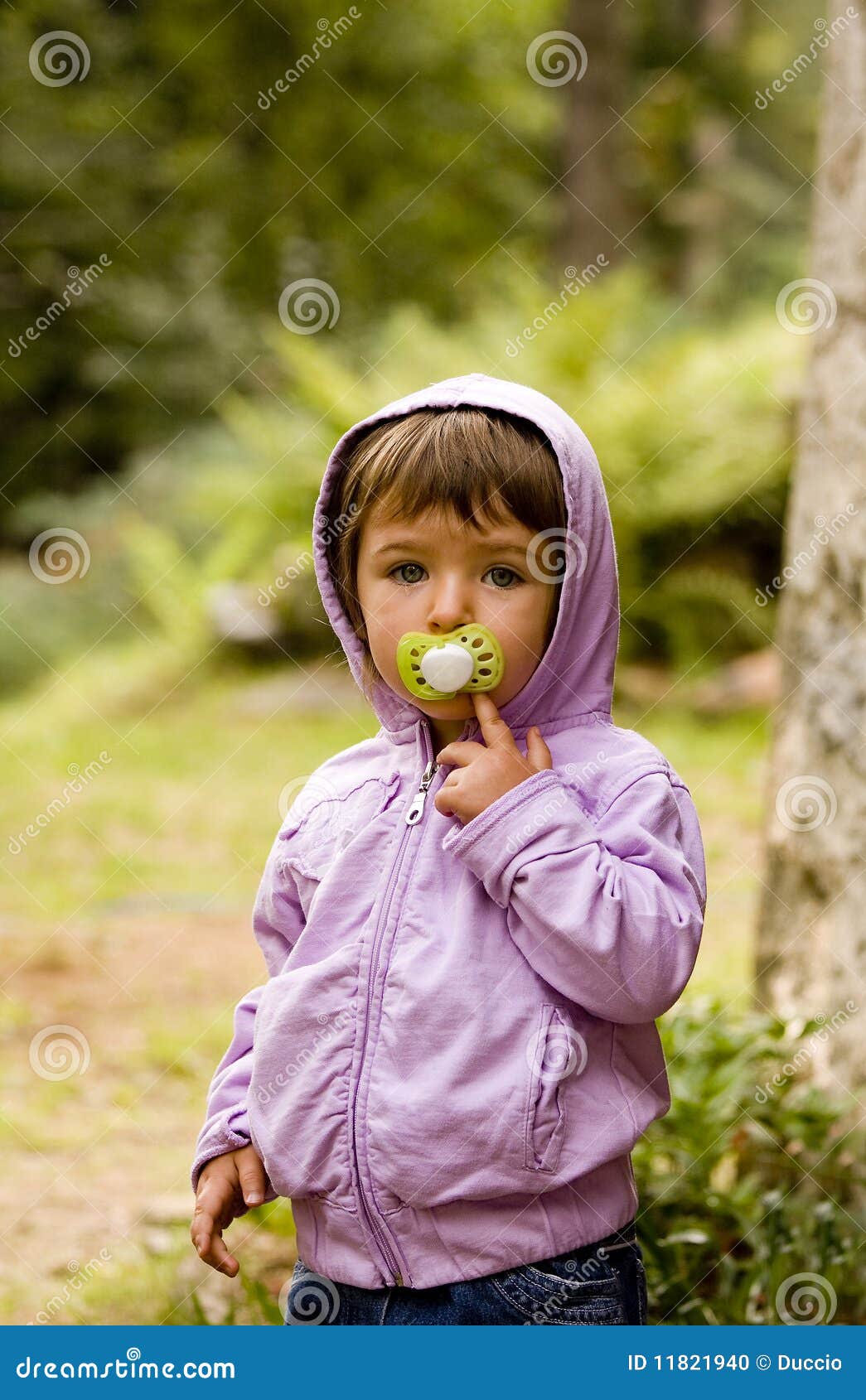 Children with pacifier stock photo. Image of melancholy - 11821940