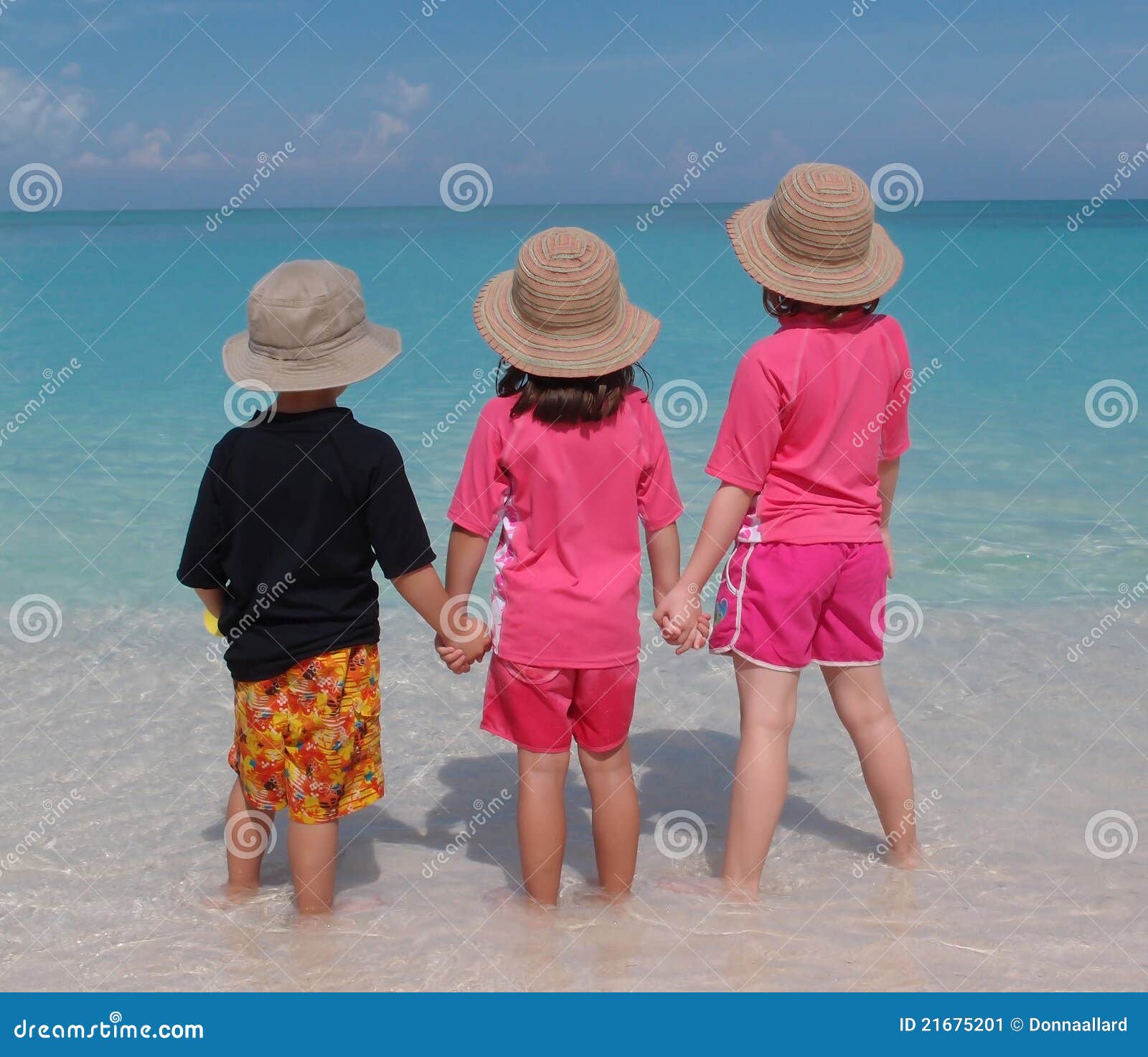 Children paddling in sea stock image. Image of children - 21675201