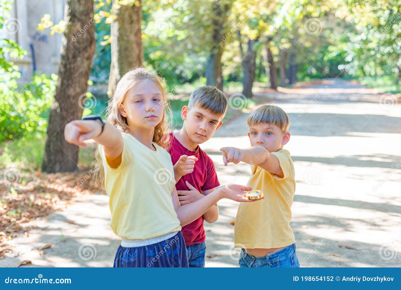 Children With A Compass Do Not Know Where To Go And Point In Different ...