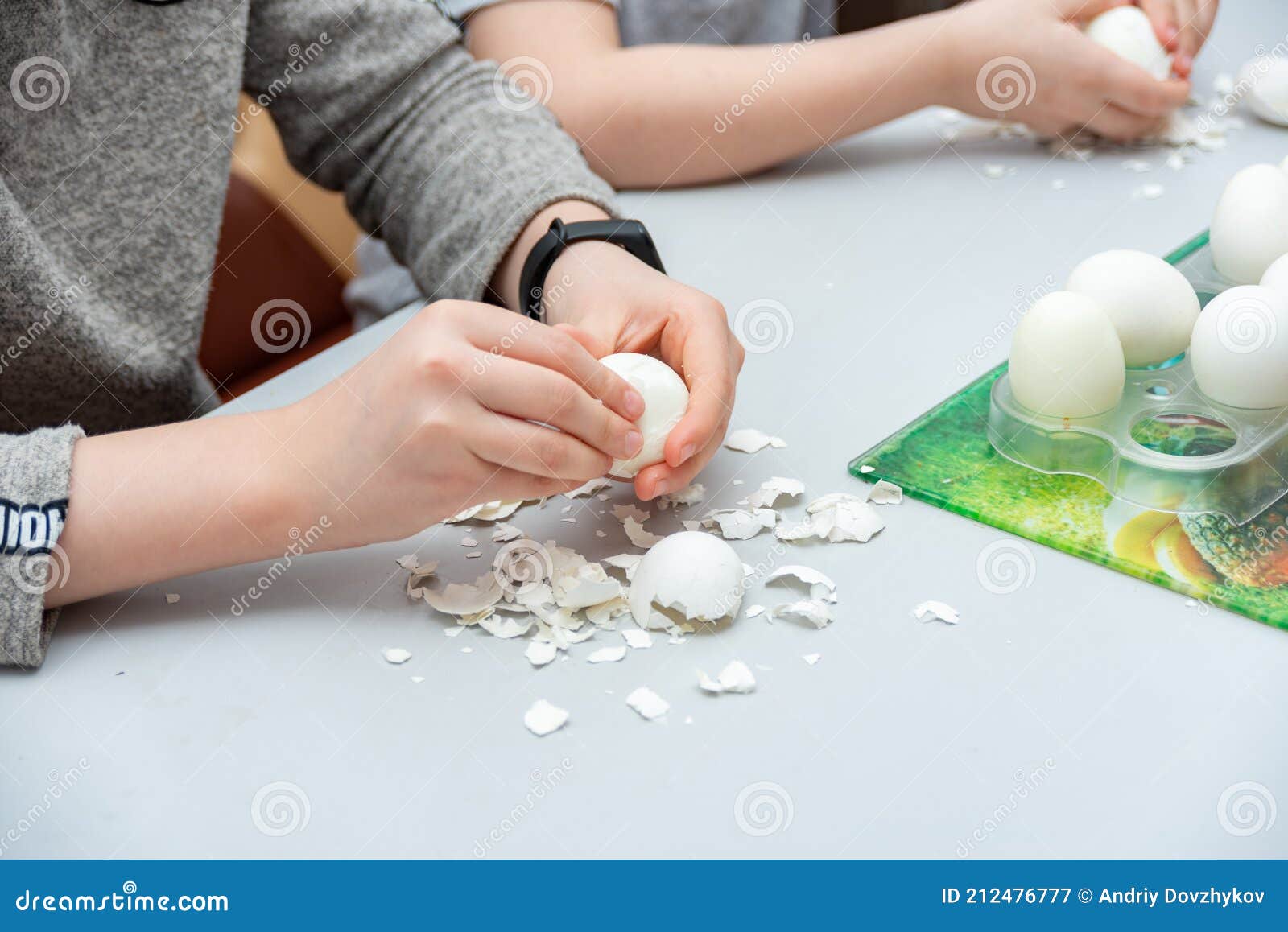 Children Peel Boiled Eggs from Their Shells for Making Salads Stock ...