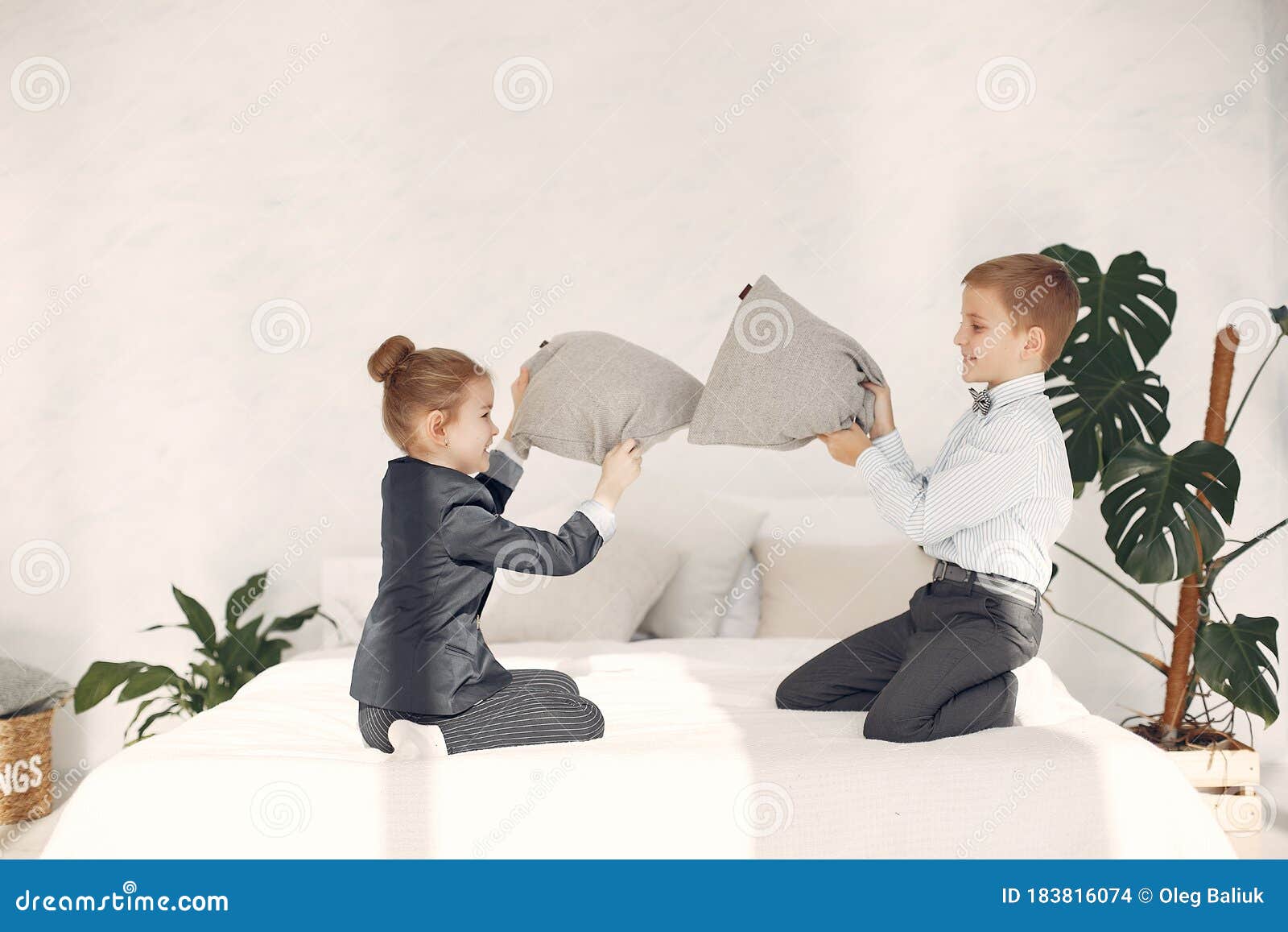 Children at Home Fight Pillows Stock Photo - Image of cheerful ...