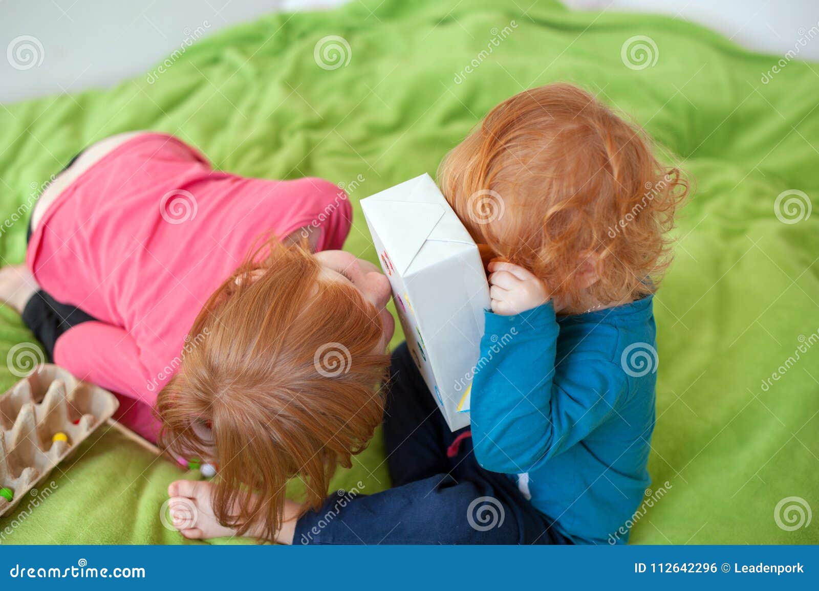 Children Play with a Cardboard Box Stock Photo - Image of children ...