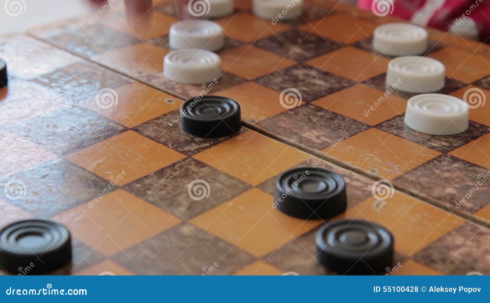 Children play checkers stock footage. Video of game, family - 55100428