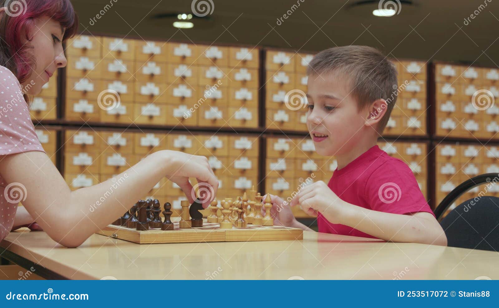 4K. Children Play Chess in the Library Stock Photo - Image of ...
