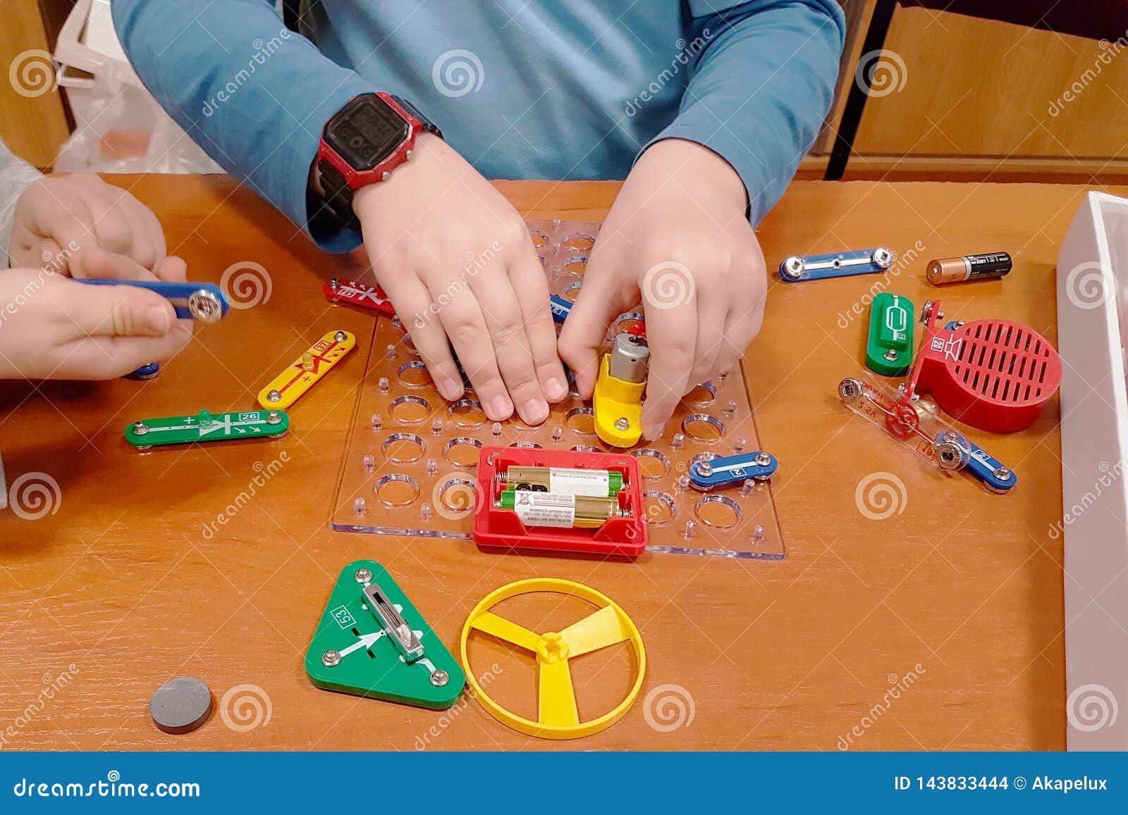 Children Play an Electro-mechanical Constructor. Edukatsiya Growing ...