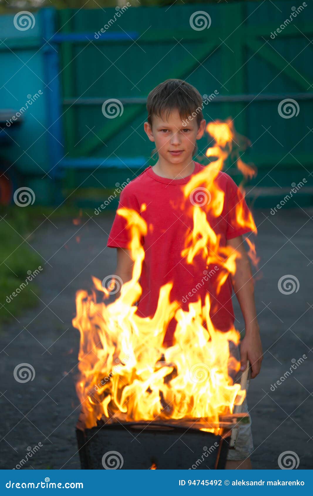 Children Play with Fire in the Grill Stock Photo - Image of face ...