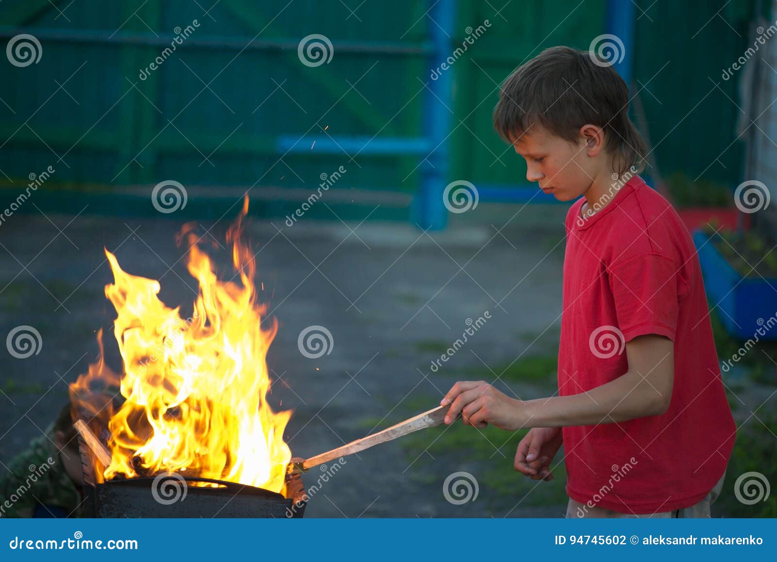 Children Play with Fire in the Grill Stock Photo - Image of barbeque ...