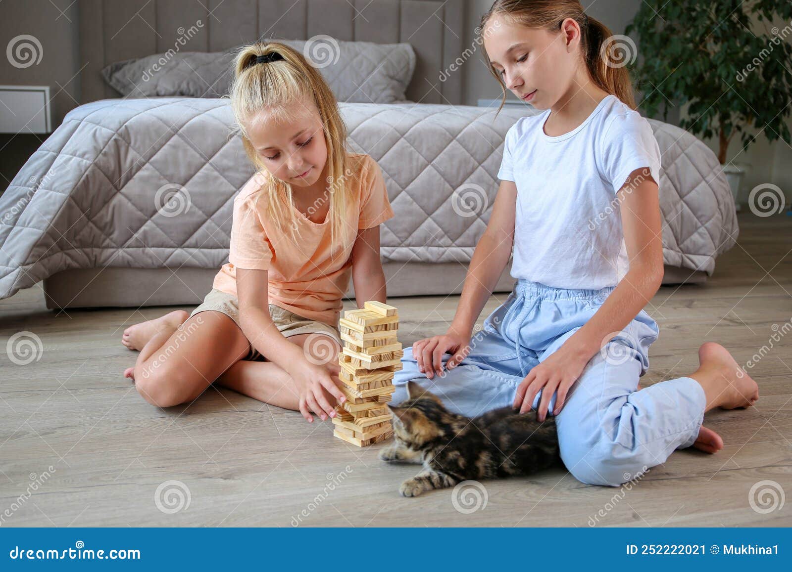 Children Play a Game at Home Stock Image - Image of build, cube: 252222021