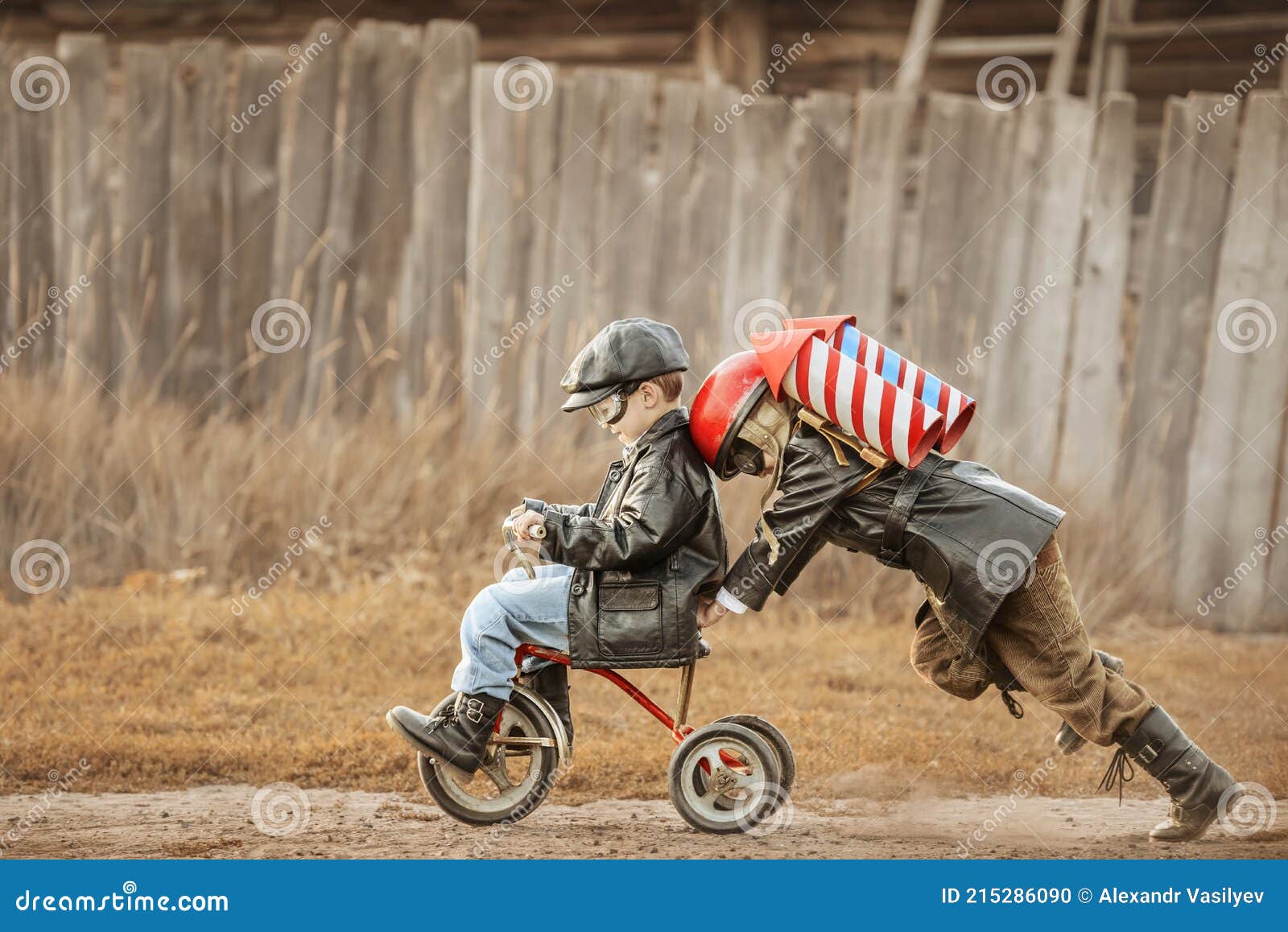 Children Play in the Rider and the Rocketman Stock Photo - Image of ...