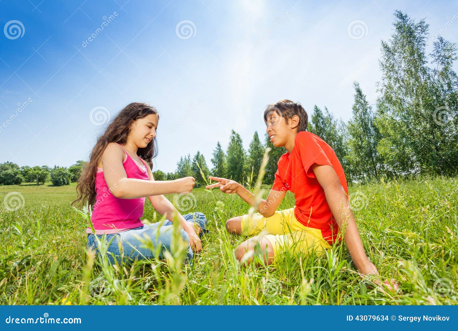 Children Play Rock-paper-scissors on Grass Stock Photo - Image of ...