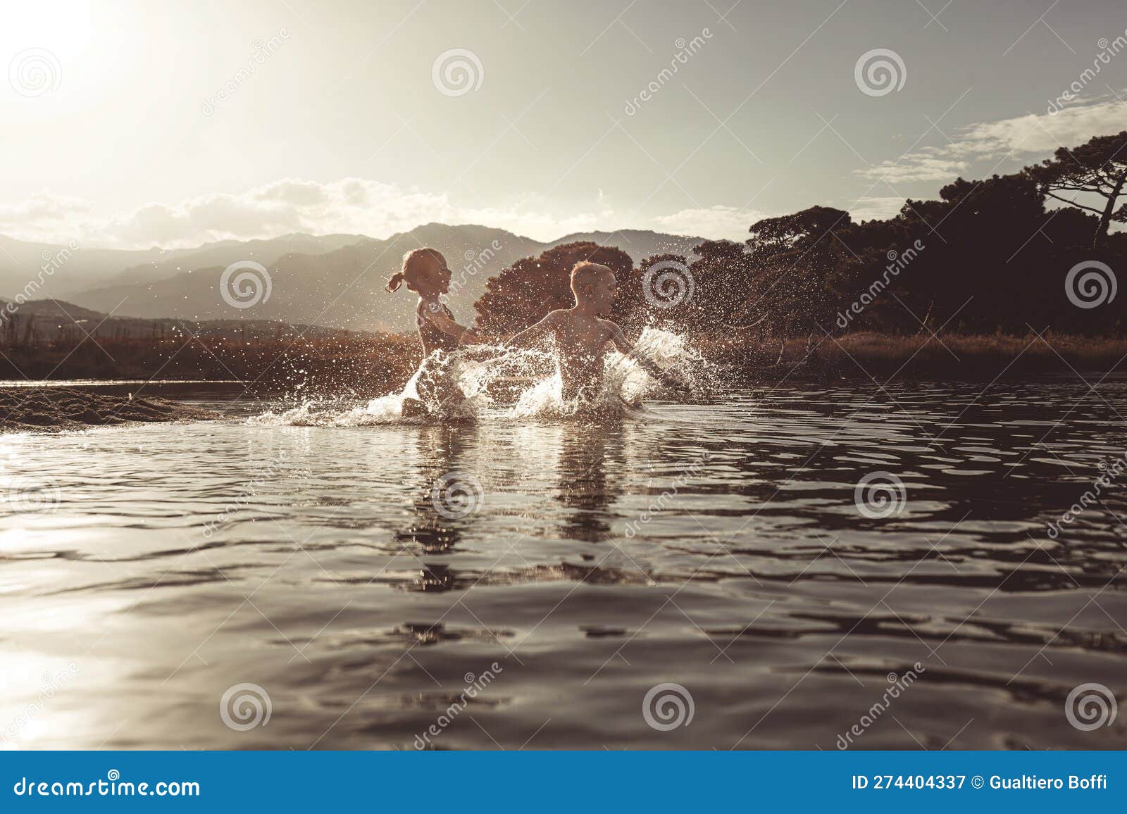 Children play in the sea stock image. Image of carefreeness - 274404337