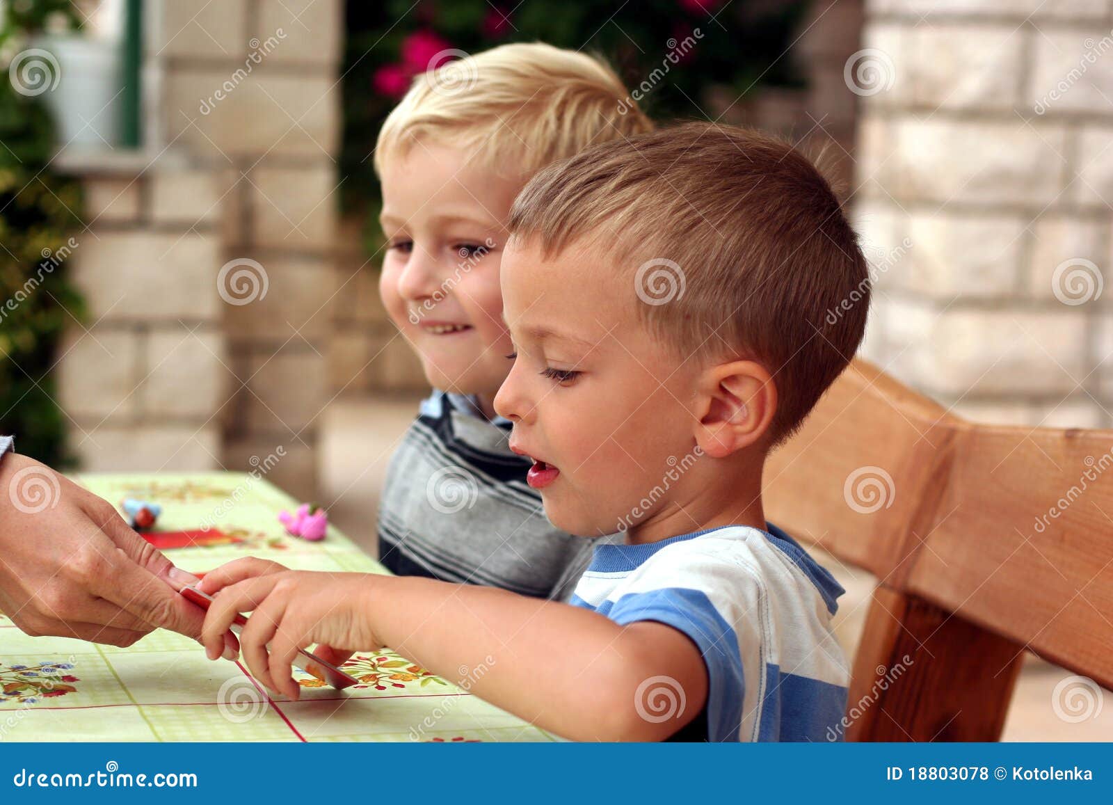 Children play a table game stock photo. Image of expression - 18803078