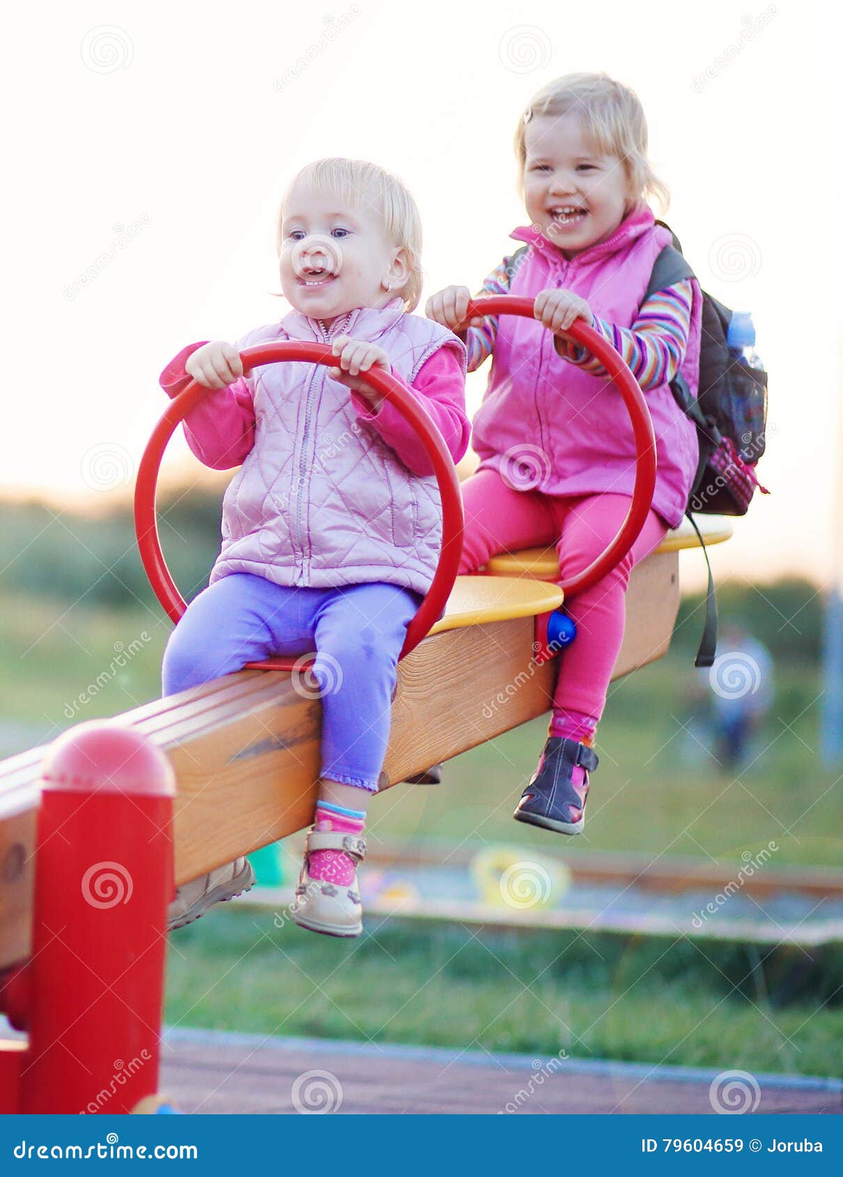 Children Play Teeter-totter Outdoor Stock Image - Image of enjoy, happy ...