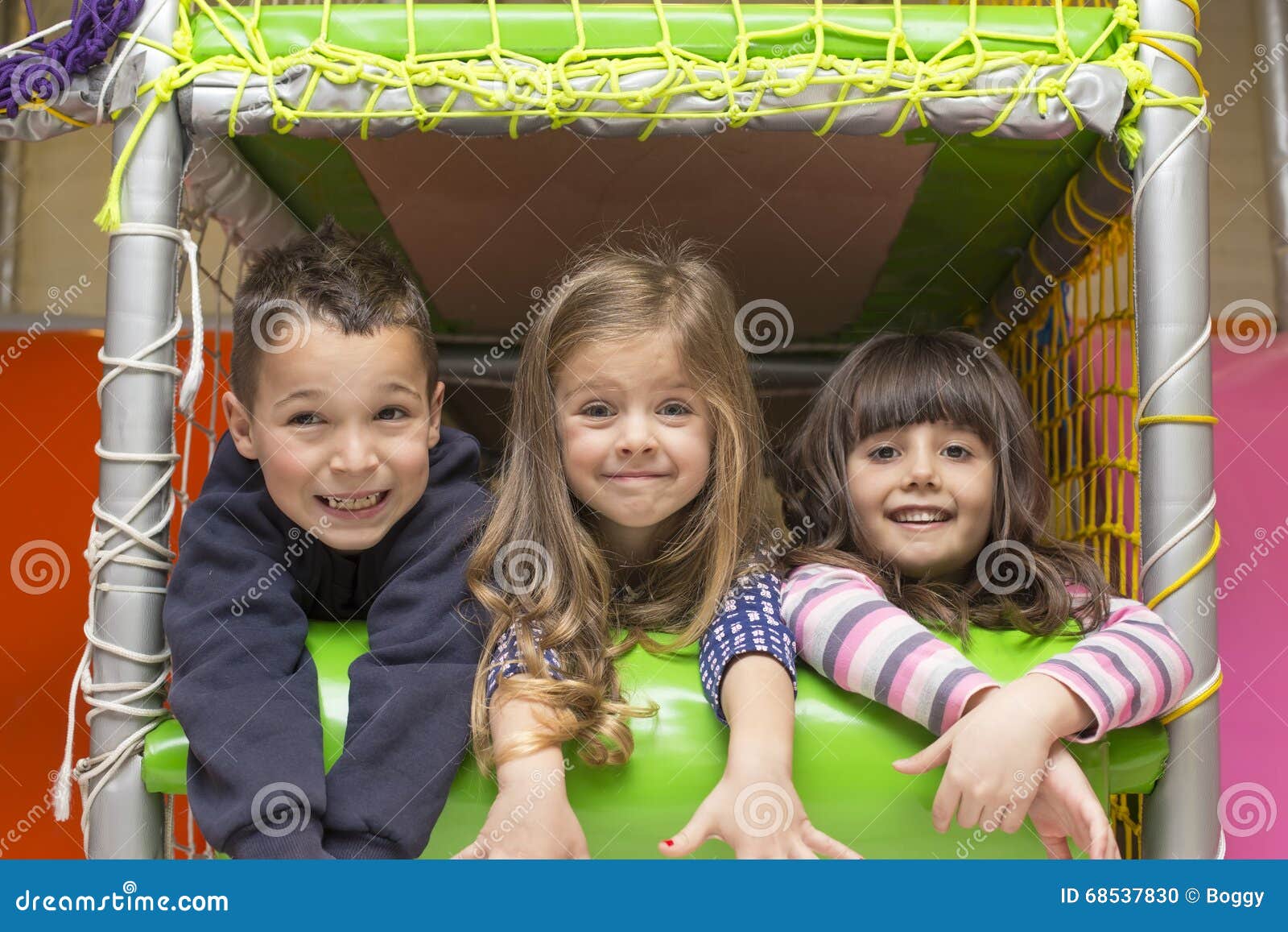 Children at playground stock photo. Image of smiling - 68537830