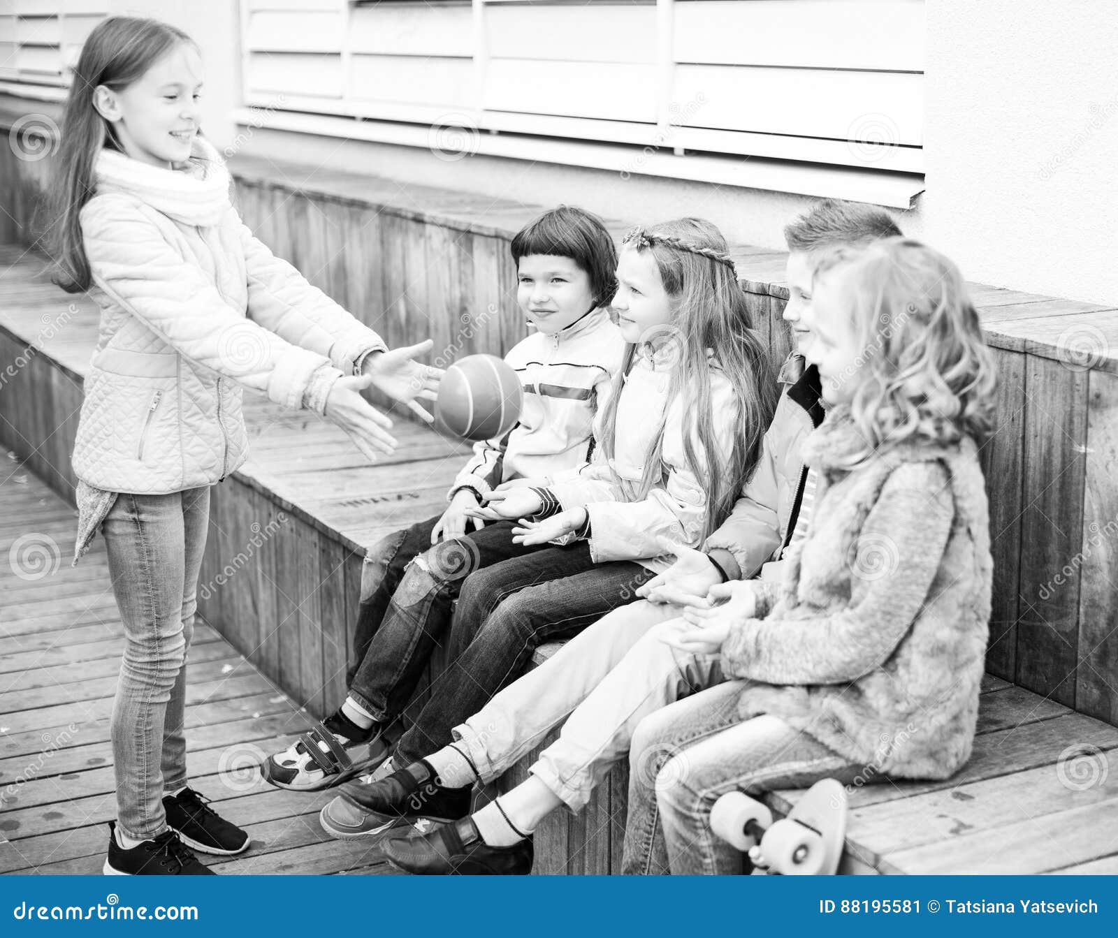 Children Playing with Ball on Bench Stock Image - Image of people ...