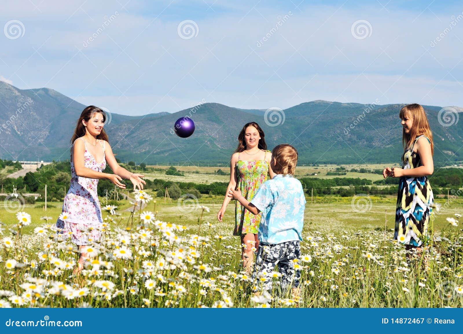 Children Playing A Ball In Fiels Royalty-Free Stock Photo ...