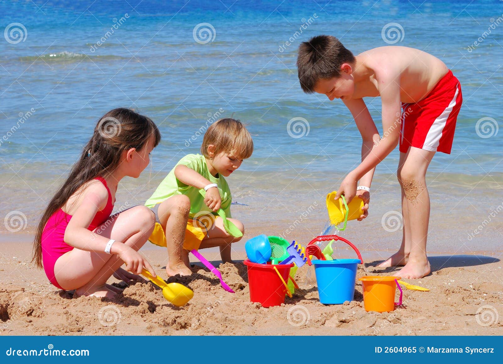 Children Playing at the Beach Stock Image - Image of enjoyment ... Children Playing at the Beach Stock Image - Image of enjoyment ...