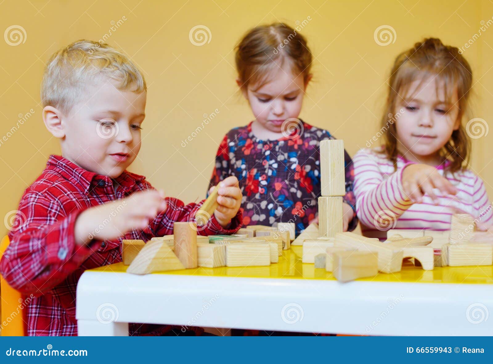 Children playing blocks stock image. Image of block, development - 66559943