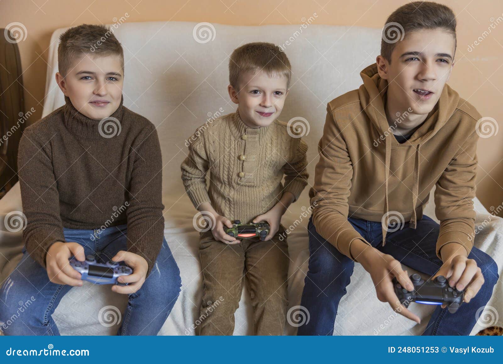 Children Playing on the Console Stock Image - Image of console ...