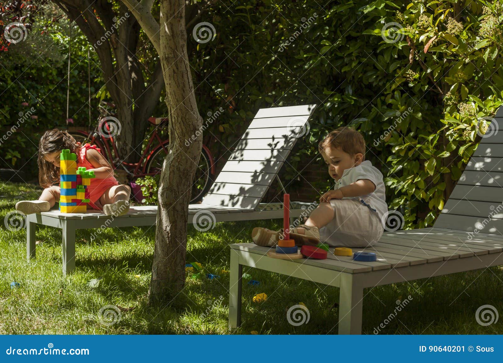 Children Playing with Construction Toys in the Garden Stock Image ...