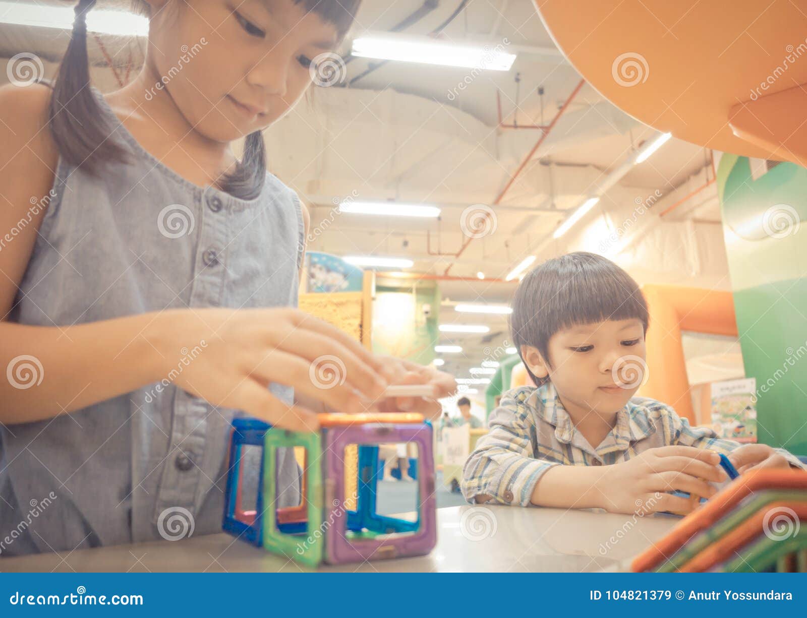 Children are Playing with Educational Toy in Classroom Stock Image ...