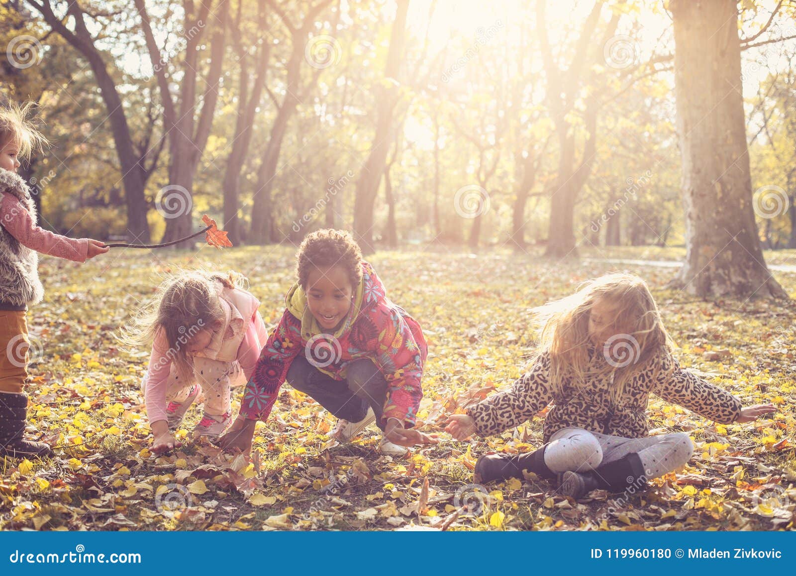 Children Playing with Fallen Leaves. Stock Photo - Image of caucasian ...