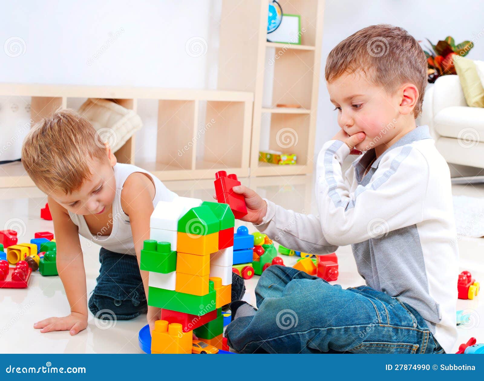 Children Playing on the Floor Stock Photo - Image of group, bricks ...