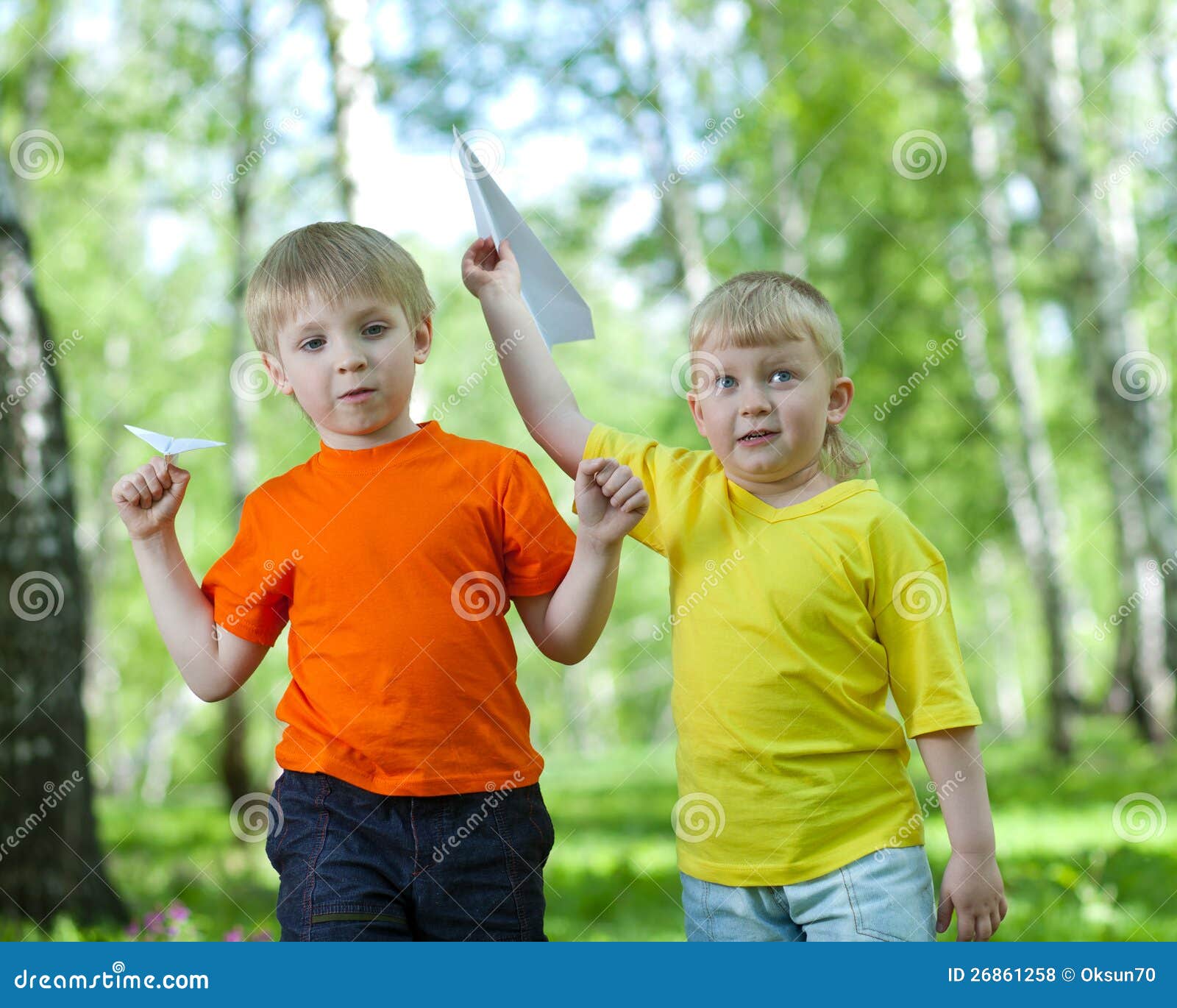 Children Playing and Flying a Paper Airplane Stock Photo - Image of ...