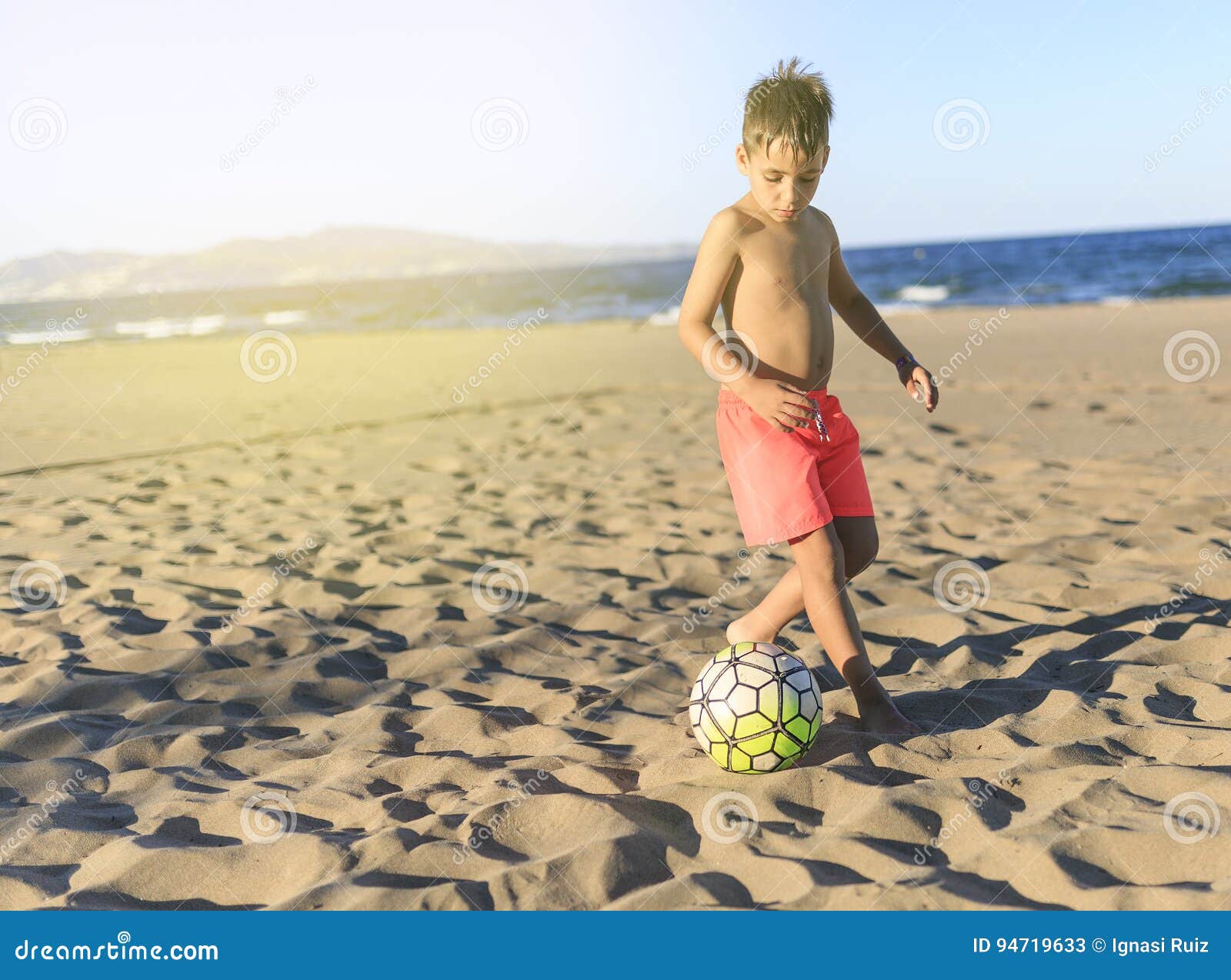 Children Playing Football on the Beach Stock Image - Image of child ...